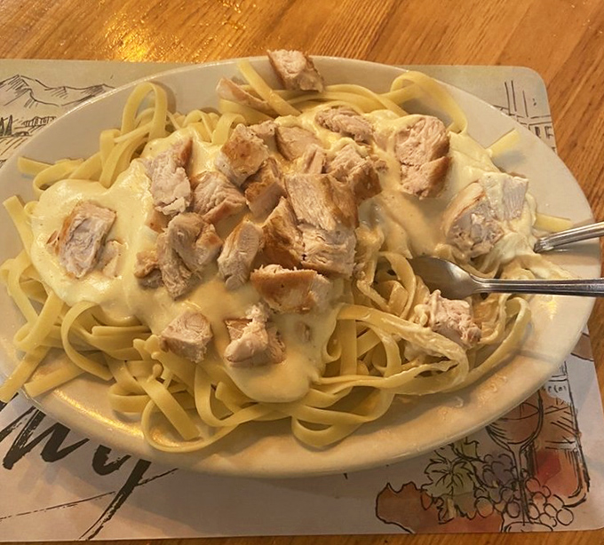 The star of the show: Chicken Alfredo that makes you question why you ever settled for chain restaurant versions. This is the real deal.