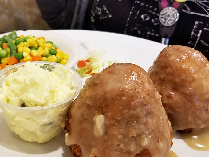 The legendary chicken croquettes in their golden-brown glory. Two perfect mounds of comfort that make you understand why people drive across state lines.
