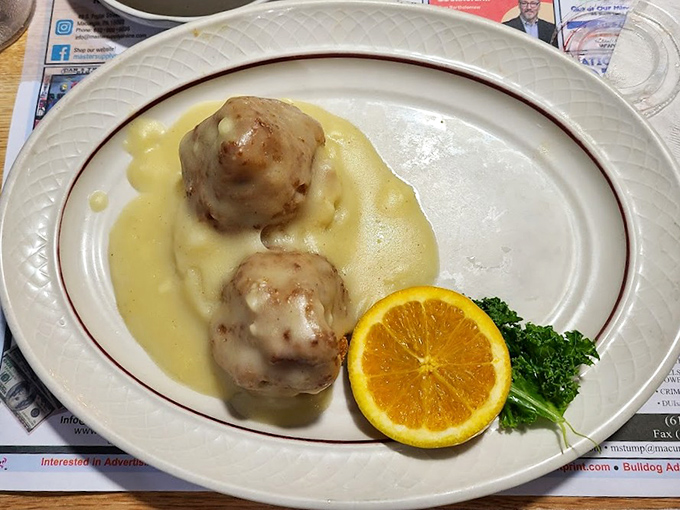 These chicken croquettes aren't just food; they're edible poetry&mdash;golden-brown spheres of seasoned perfection swimming in gravy that would make your grandmother weep with joy.