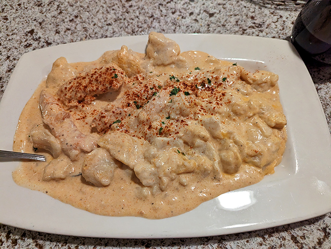 The legendary chicken paprikash&mdash;where creamy meets tangy in a dance so perfect you'll want to applaud between bites.