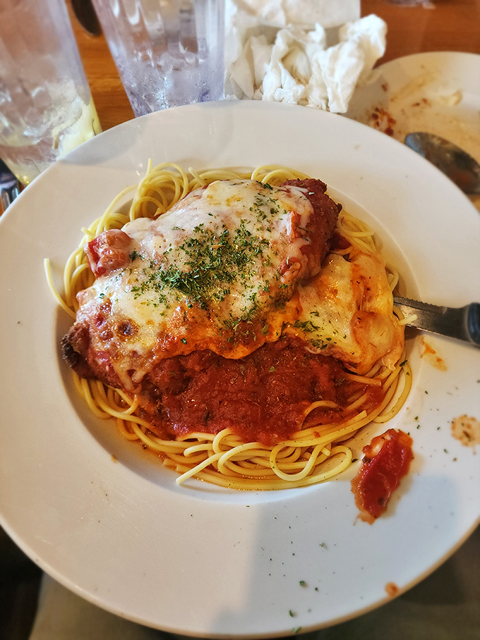 The legendary chicken parm in all its glory &ndash; where melted cheese meets marinara in a romance so perfect it should have its own reality show.