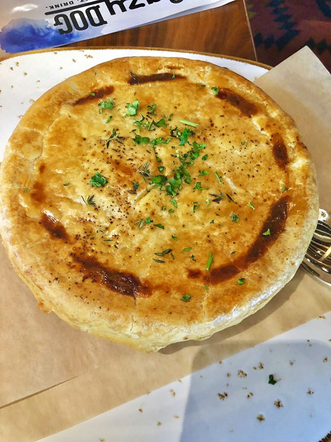 Not your grandmother's pot pie (though she'd approve). This golden-crusted beauty hides a savory treasure chest beneath its herb-flecked lid.
