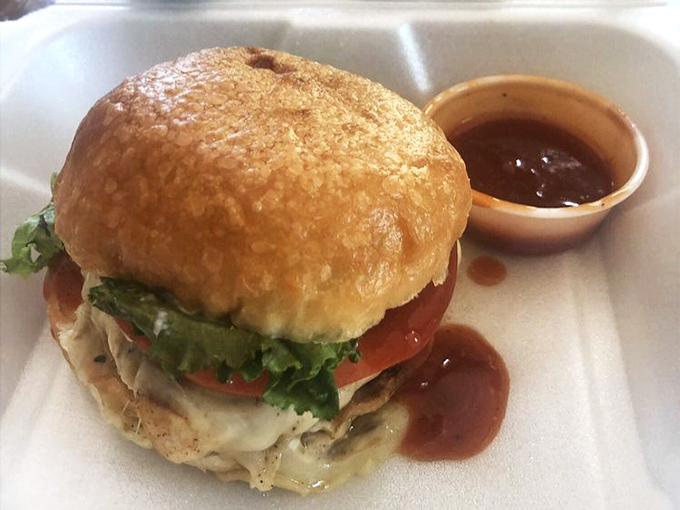 This isn't just a chicken sandwich; it's a masterclass in simplicity and execution. The golden bun practically glows with promise of the perfectly seasoned goodness within.