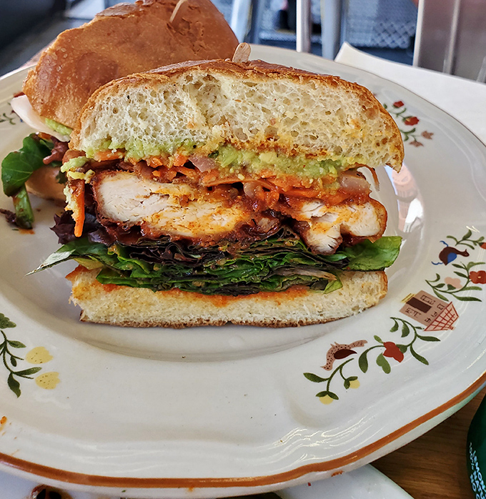The sandwich that launched a thousand food pilgrimages. Teriyaki chicken nestled between pillowy brioche with that perfect caramelized edge that dreams are made of.