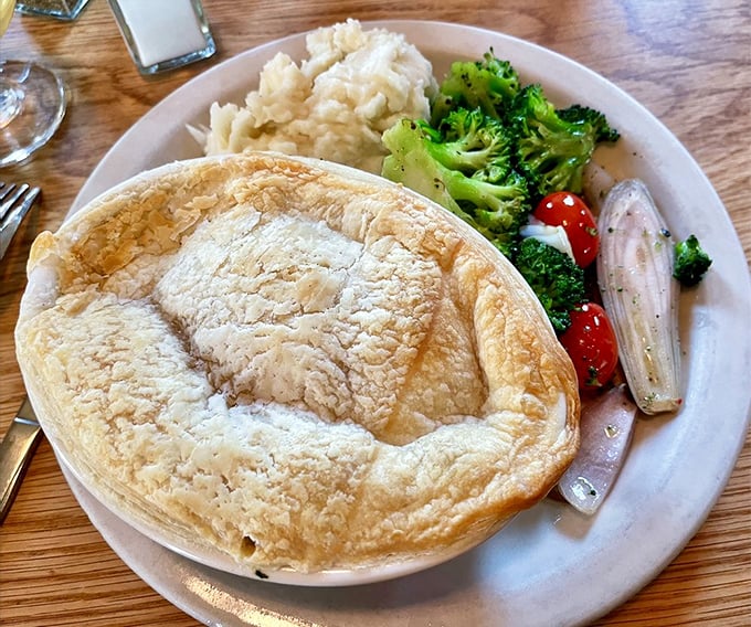 Not your grandmother's pot pie (though she'd approve). This golden-domed beauty with its buttery crust is comfort food elevated to art form.