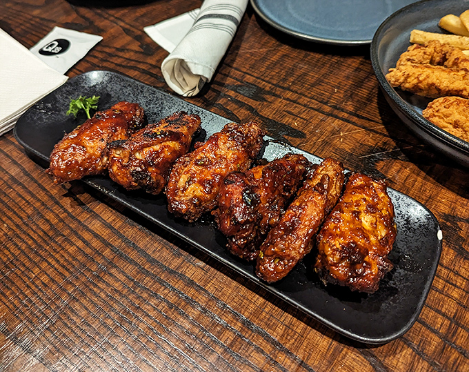 These aren't your typical bar wings &ndash; they're smoke-kissed masterpieces that'll make you forget buffalo sauce exists.