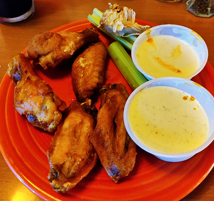 These golden beauties arrive like edible treasure, complete with ranch and celery you'll probably ignore.