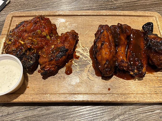 These wings aren't just grilled; they're transformed into sticky, caramelized flavor bombs that'll have you licking your fingers with zero shame.