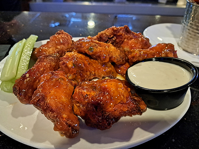These wings aren't just crispy&mdash;they're having a meaningful relationship with that Buffalo sauce. Celery sticks standing by for moral support and cooling relief.