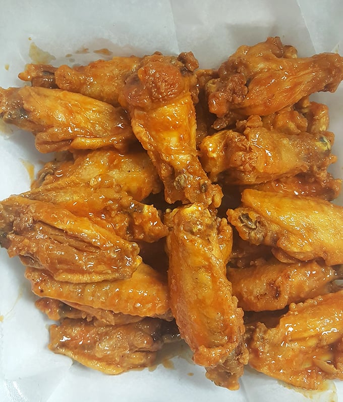 Wing perfection isn't complicated&mdash;just perfectly crispy, generously sauced, and meaty enough to make you question everything you thought you knew about chicken anatomy.