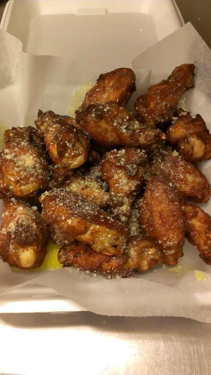 These aren't just wings; they're crispy, Parmesan-dusted flavor bombs that make you wonder why you ever bothered with those chain restaurants.