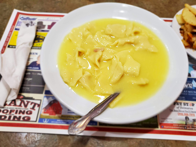 Chicken and dumplings so golden and rich, they could make your grandmother question her own recipe's supremacy.