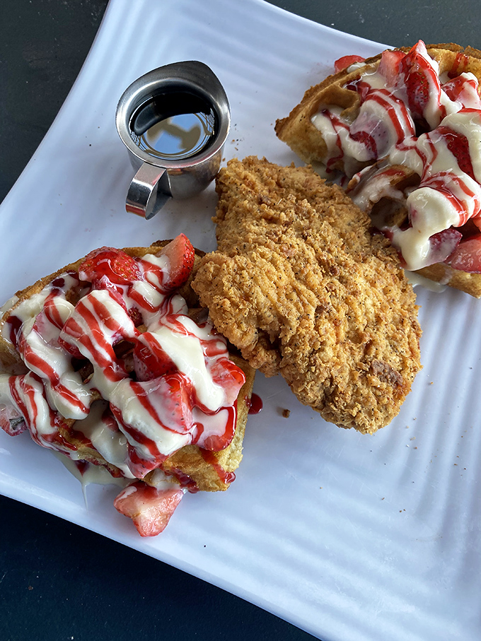 Crispy golden chicken meets strawberry-topped French toast in a sweet-savory romance that would make even the most dedicated dieter throw caution to the wind.
