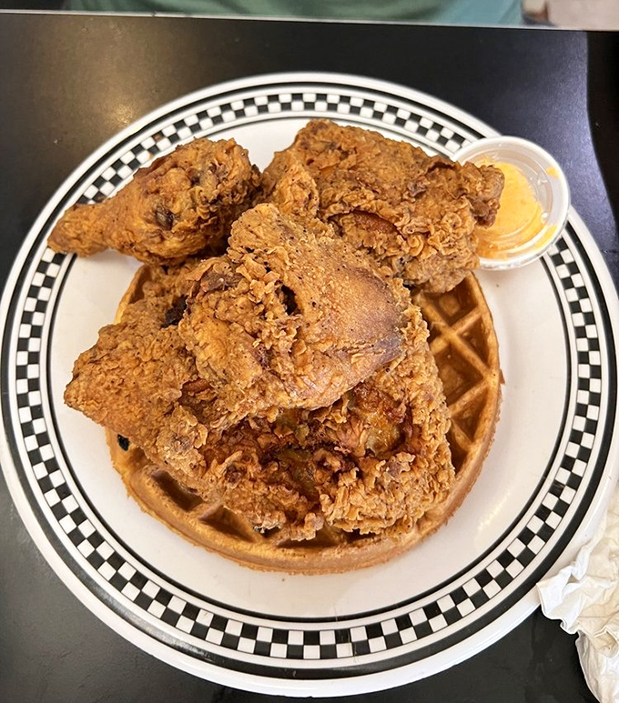 Behold the golden masterpiece that's converting waffle skeptics into true believers, one crispy bite at a time.