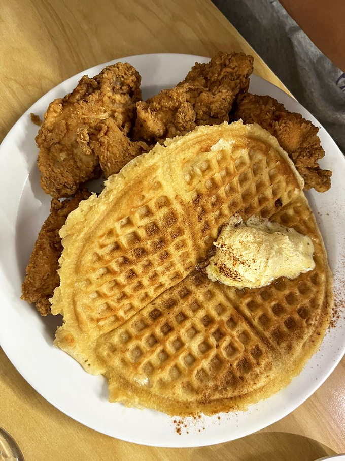 Golden chicken meets fluffy waffles in this Southern comfort masterpiece that'll make your taste buds sing hallelujah.