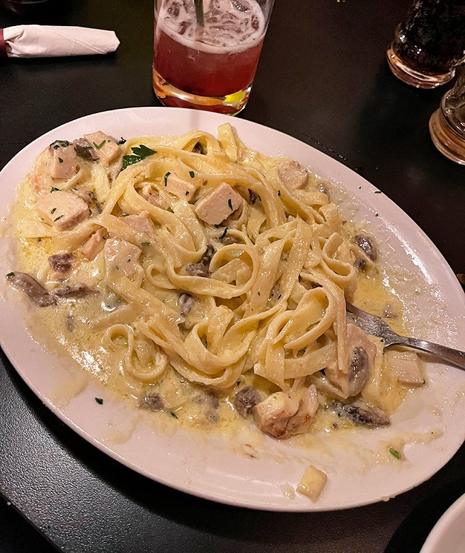 This chicken fettuccine Alfredo isn't just dinner&mdash;it's a silky, creamy masterpiece that makes you understand why people willingly drive hours for a single forkful.