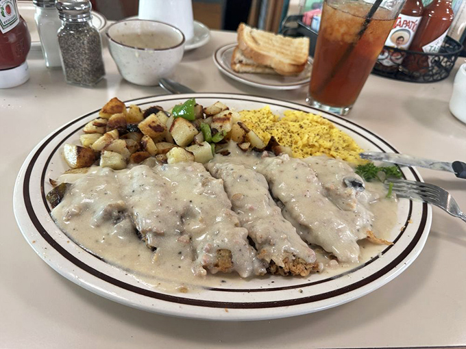 The star of the show: chicken fried steak swimming in gravy so good you'll want to write it love letters.