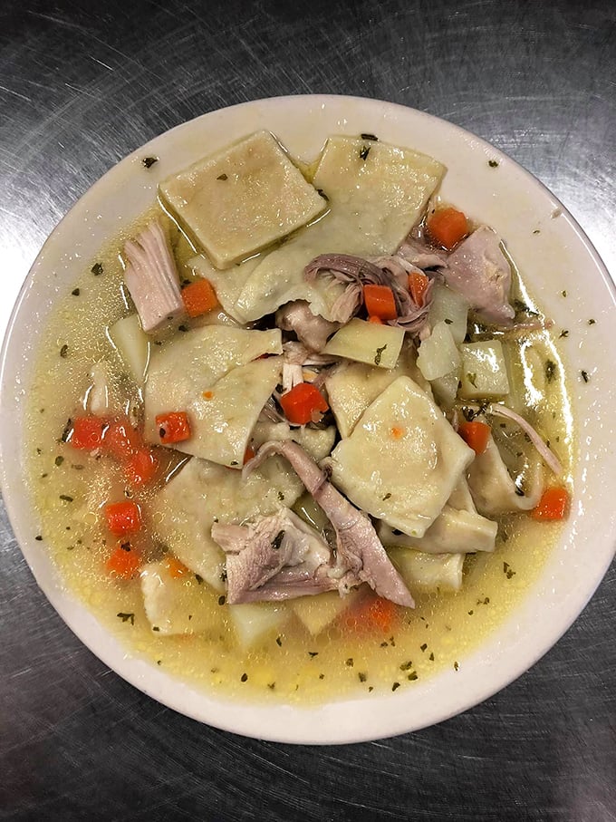 This isn't your grocery store pot pie &ndash; square-cut noodles swimming with tender chicken in a broth so comforting it could end family feuds.