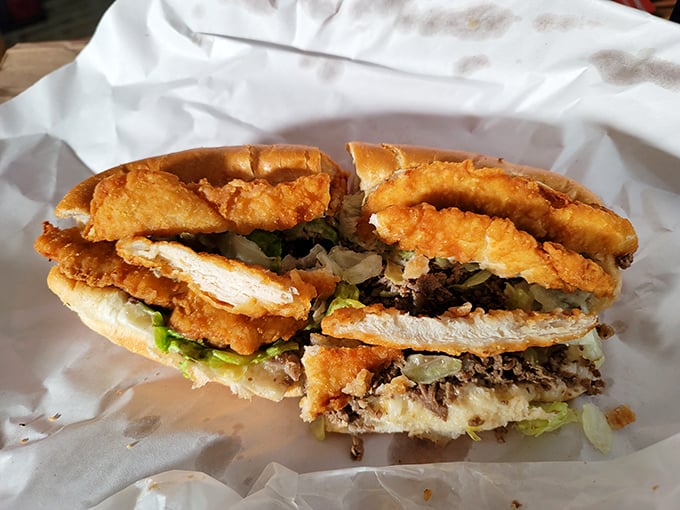 Crispy chicken perfection nestled in a fresh roll &ndash; proof that sometimes the simplest pleasures deliver the most profound satisfaction.
