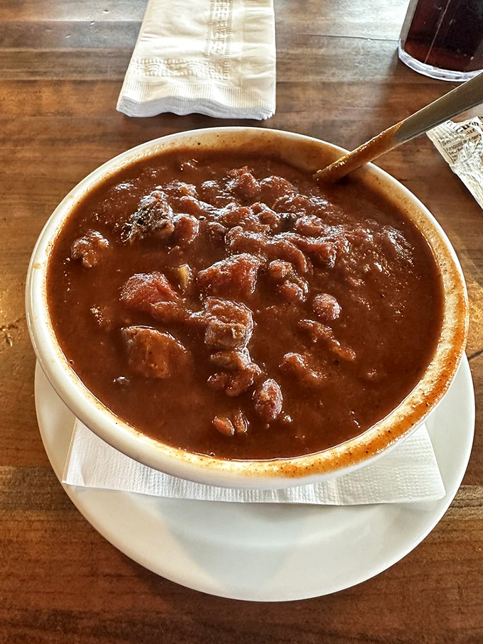 The legendary brisket chili&mdash;where chunks of smoky beef swim in a rich, spiced broth. This isn't just soup; it's a warm hug in a bowl with a smoky accent.