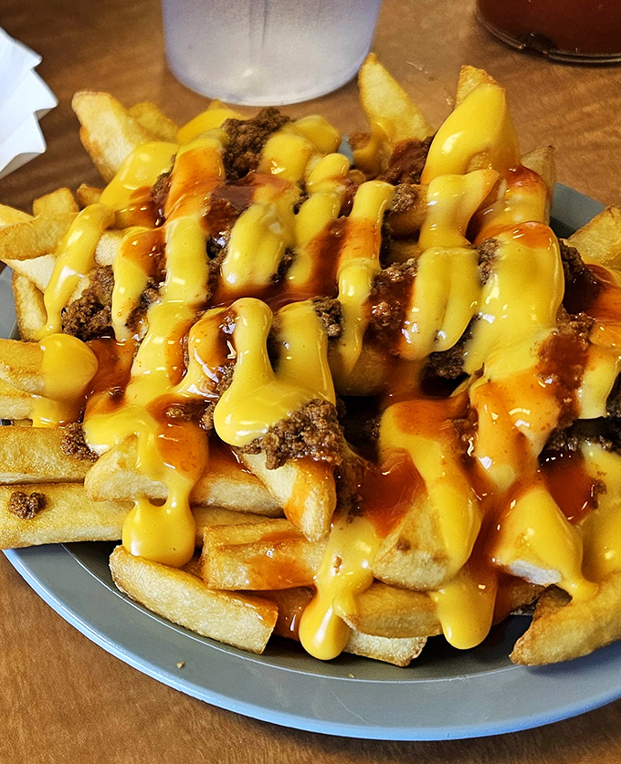 Behold the crown jewel: chili cheese fries that make fancy truffle versions seem like unnecessary showing off. This is comfort food royalty.e fries