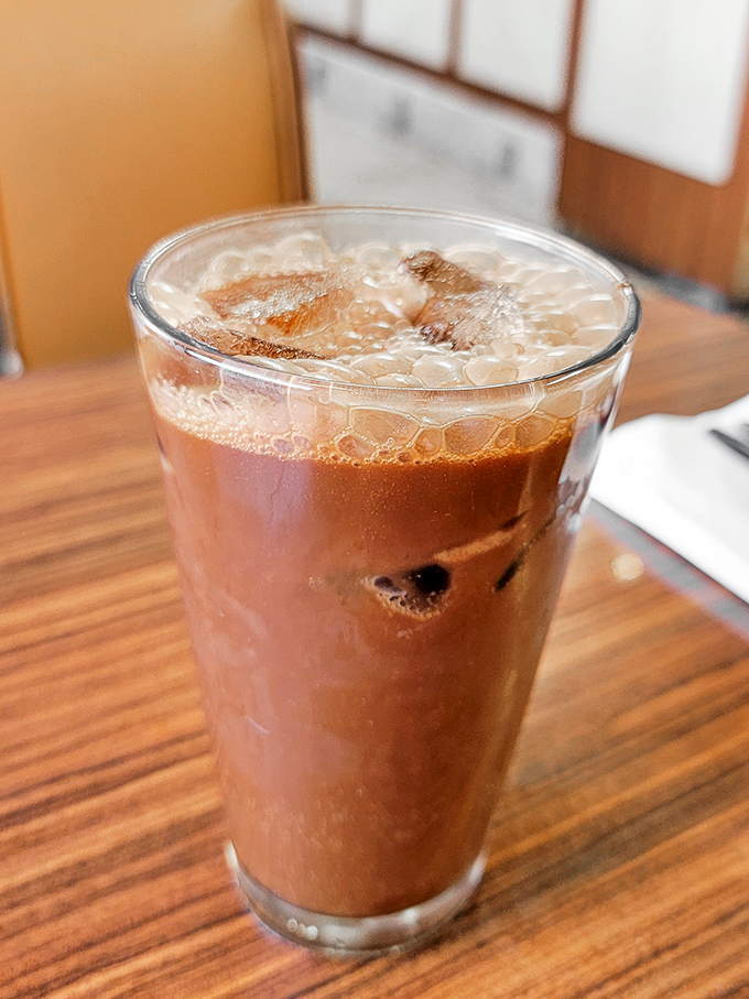 The chocolate Coke isn't just a drink, it's a time machine in liquid form, fizzing with nostalgia and childhood wonder.