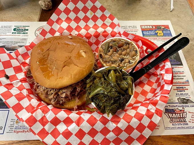The pulled pork sandwich doesn't just sit there&mdash;it beckons. Those collard greens and baked beans aren't mere sides; they're supporting actors deserving their own spotlight.