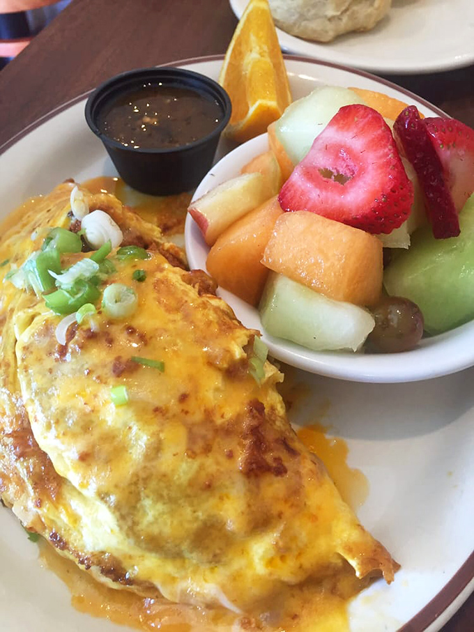 Behold the star of our show &ndash; a chorizo omelet that's achieved neighborhood legend status. That side of fresh fruit isn't just garnish, it's redemption.