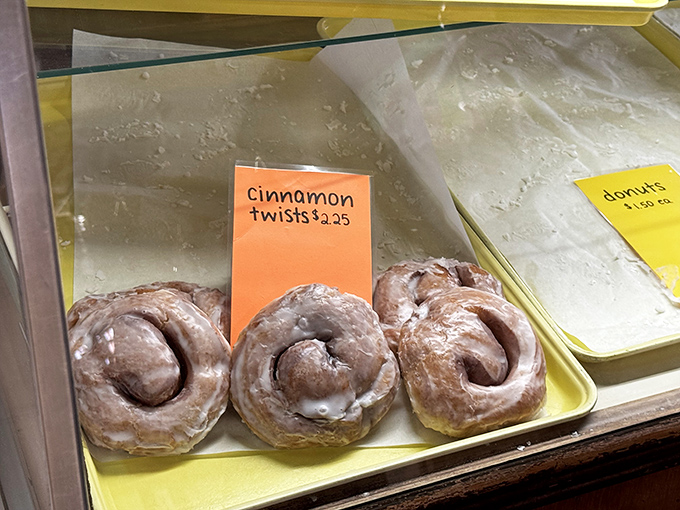 Cinnamon twists that could make a French pastry chef weep with joy. Three dollars and twenty-five cents for what amounts to edible therapy.
