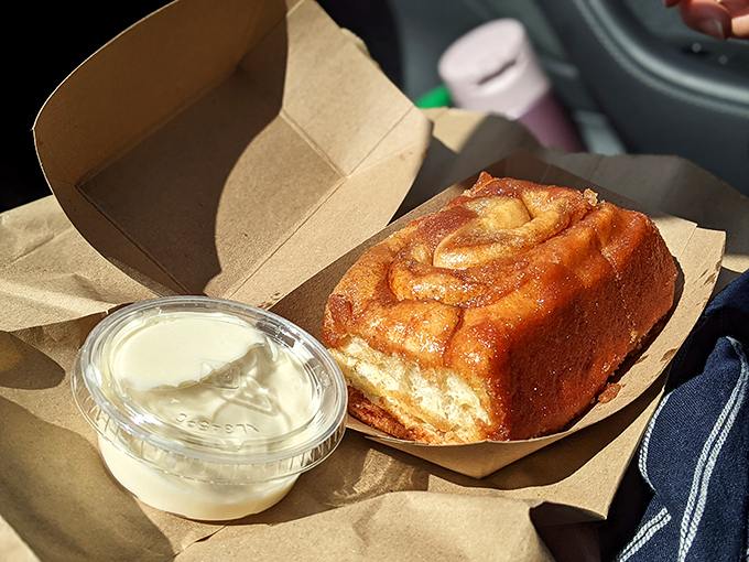 Behold the architectural marvel of dough and cinnamon! This golden-brown beauty demands respect and possibly a moment of silence.