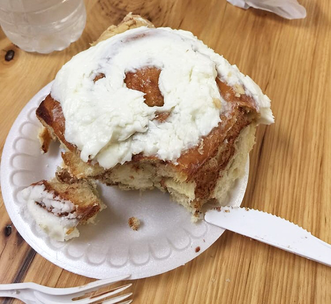 This isn't just a cinnamon roll&mdash;it's edible architecture, a spiral of joy crowned with frosting that makes Monday mornings bearable again.