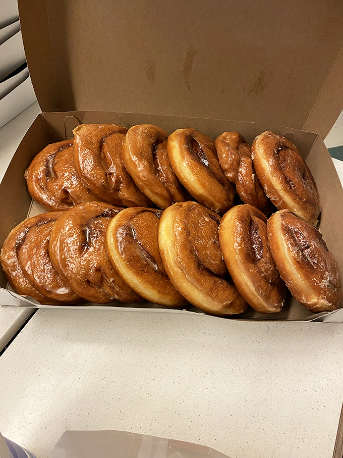 These glazed beauties aren't just donuts&mdash;they're edible gold medals, lined up in their box like Olympic champions of the breakfast world.