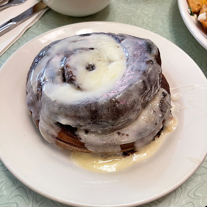 This isn't just a cinnamon roll&mdash;it's a spiritual experience. The Ooey Gooey Cinna-Biscuit glistens with glaze that cascades down its pillowy swirls.