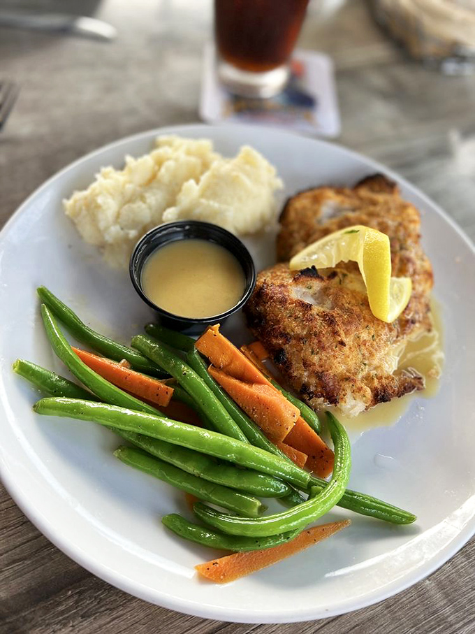 A perfectly golden fish fillet that's had a proper introduction to heat, served with vegetables that didn't come from a freezer. This is adulting done right.