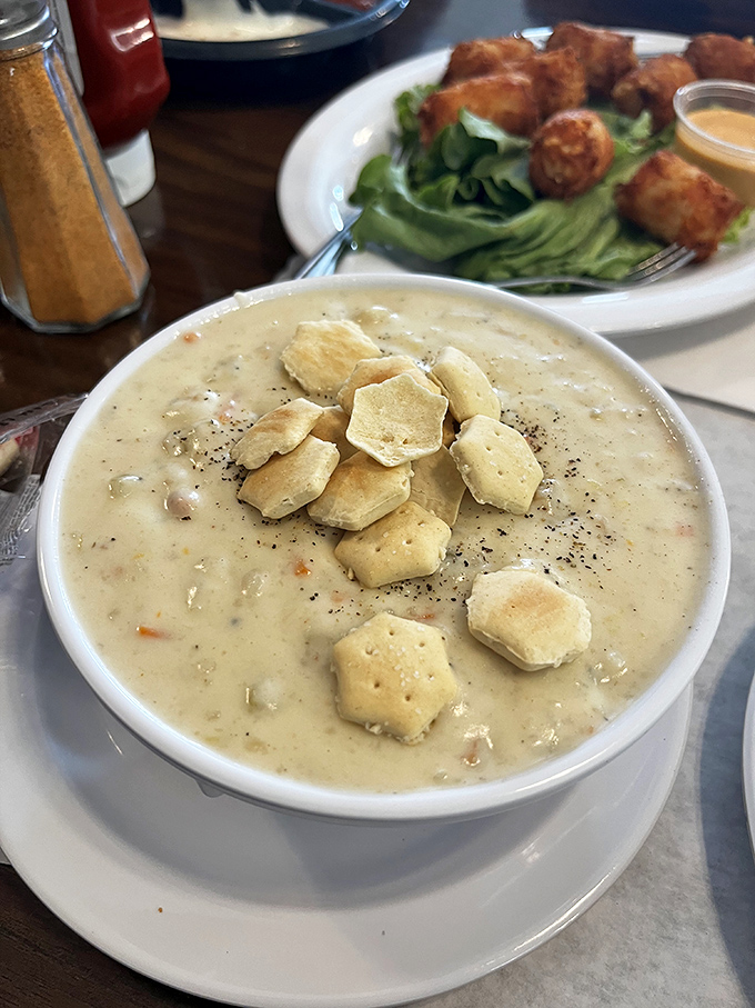 Creamy clam chowder topped with oyster crackers&mdash;the kind that makes you close your eyes and forget your table manners.