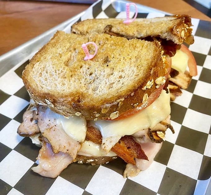 This isn't just a sandwich&mdash;it's architecture with mayo. Layers of goodness between perfectly toasted bread create the ultimate handheld masterpiece.