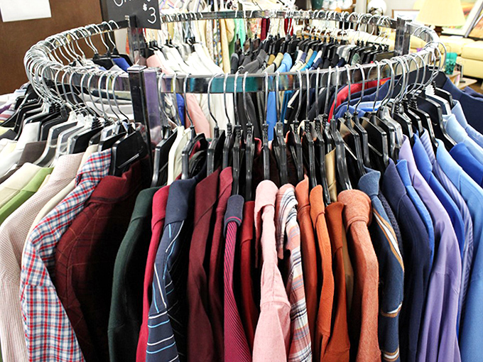 A color-coded carousel of possibility. Like a fashionista's fever dream, these racks hold everything from forgotten trends to timeless classics waiting for their second act.