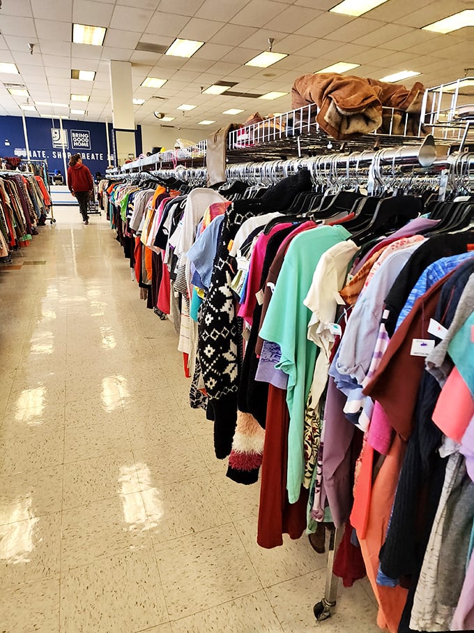 Rainbow rows of possibility hang in perfect formation. In this textile library, someone else's fashion regret becomes your signature find.