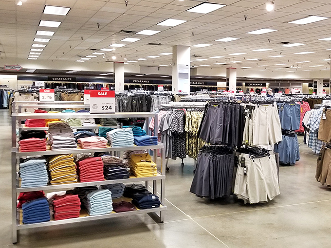 Neatly folded rainbows of fabric create a shopper's color wheel, where wardrobe transformations begin with the simple question: "Regular price where?"