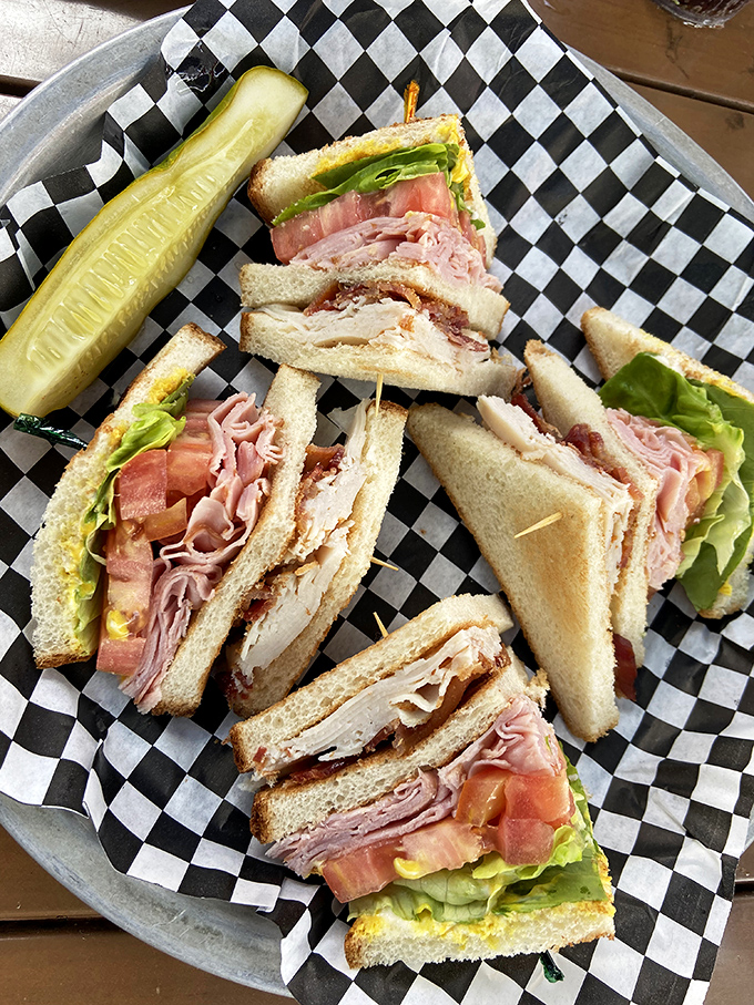 This club sandwich isn't playing games&mdash;it's a skyscraper of freshness that requires either a dislocated jaw or strategic sandwich compression techniques.