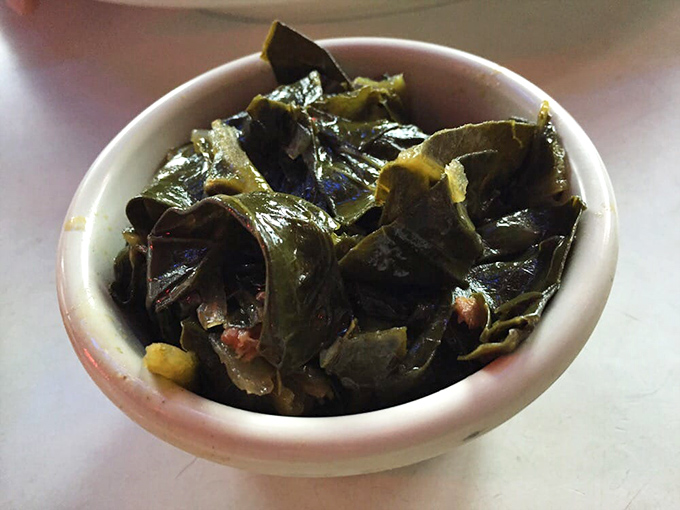 These collard greens aren't just a side dish; they're a Southern sermon slow-simmered to silky perfection with hints of smoky depth.
