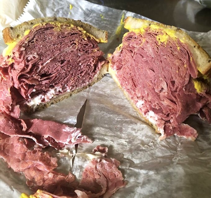 This isn't just a sandwich&mdash;it's Cleveland's edible monument to corned beef perfection, where each pink layer tells a story of patience and tradition. 