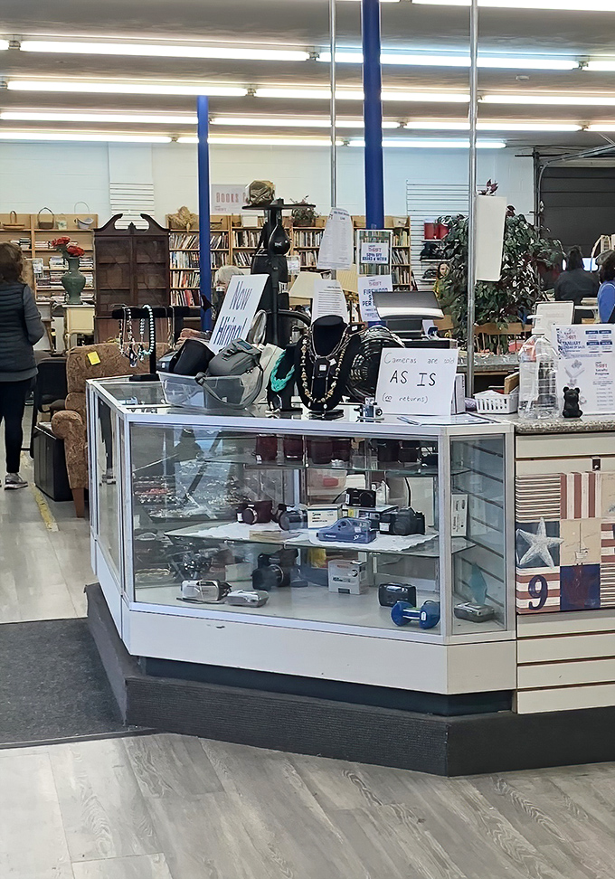 Display cases showcase the more valuable finds&mdash;vintage cameras and jewelry that whisper stories of decades past, waiting for new chapters.