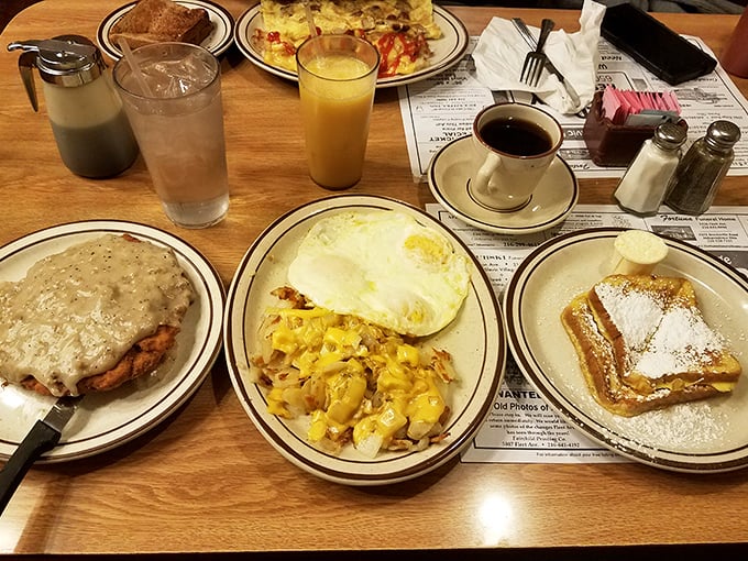 Breakfast perfection on a plate! Golden eggs, crispy hash browns, and a pancake so fluffy it practically needs its own zip code.
