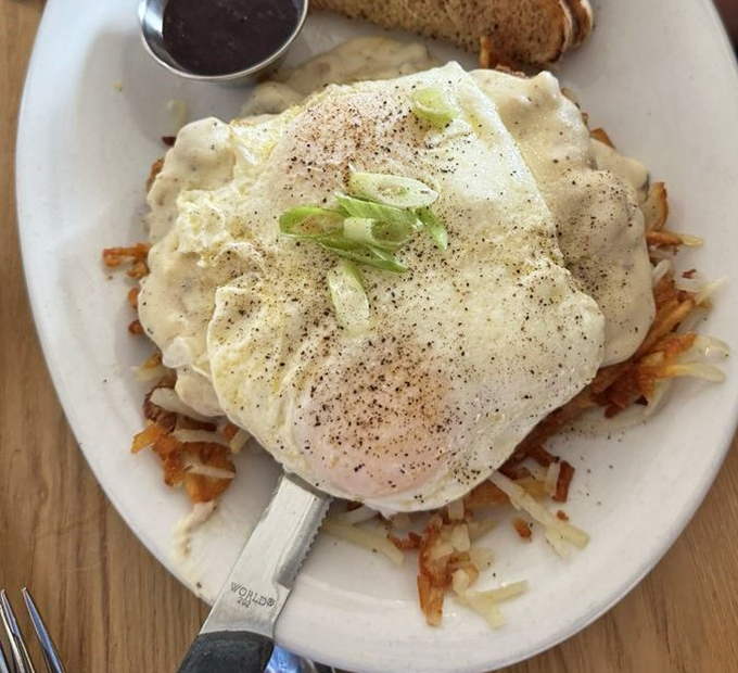 The legendary country fried steak arrives like a work of art &ndash; crispy exterior, tender meat, and gravy that could make a vegetarian reconsider life choices.