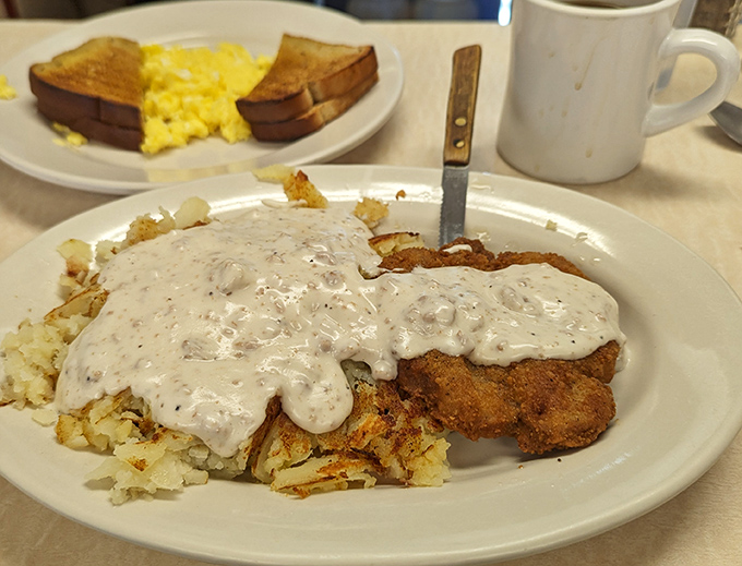 Country fried steak smothered in peppery gravy&mdash;a dish so comforting it should come with its own lullaby and tiny blanket.