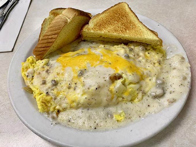 Behold the Country Omelette in all its glory&mdash;where eggs, cheese, and sausage gravy unite in a breakfast symphony that makes morning people out of night owls.