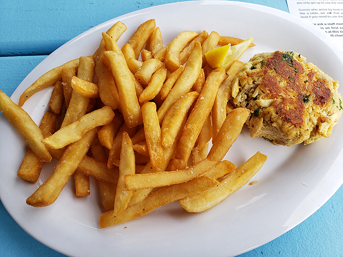 The star of the show: a golden-brown crab cake that's more crab than cake, paired with fries that could make a Frenchman weep with joy.
