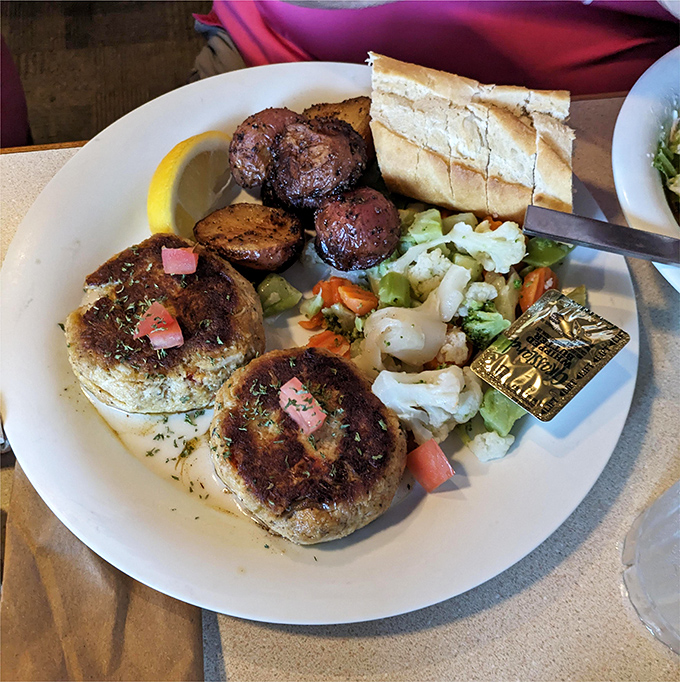 These crab cakes aren't just generous with the crab meat&mdash;they're downright philanthropic. Served with vegetables that actually taste like vegetables!