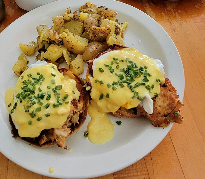 The infamous Crab Cake Benedict&mdash;where perfectly poached eggs and hollandaise conspire with crab cakes in a delicious plot against your diet.